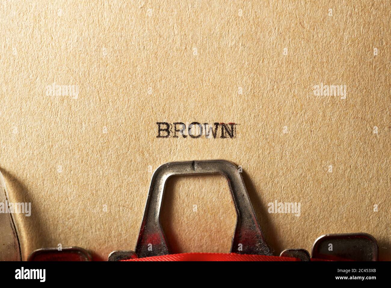 Brown word written on a paper Stock Photo - Alamy