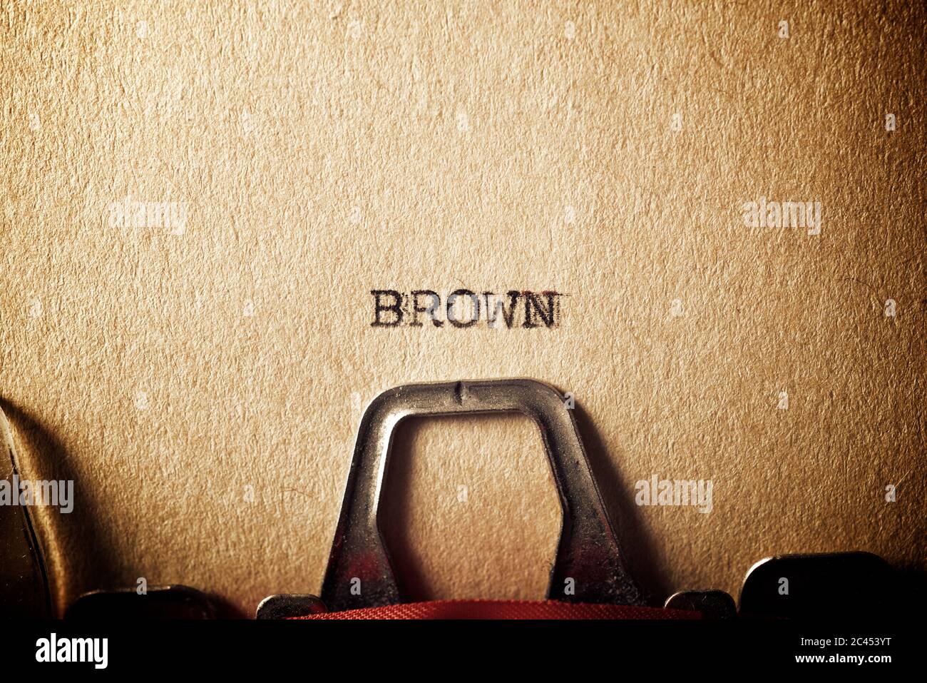Brown word written on a paper Stock Photo - Alamy