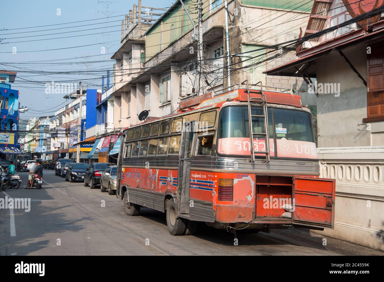 a public Bus at the Market in the city centre of Phetchaburi or ...