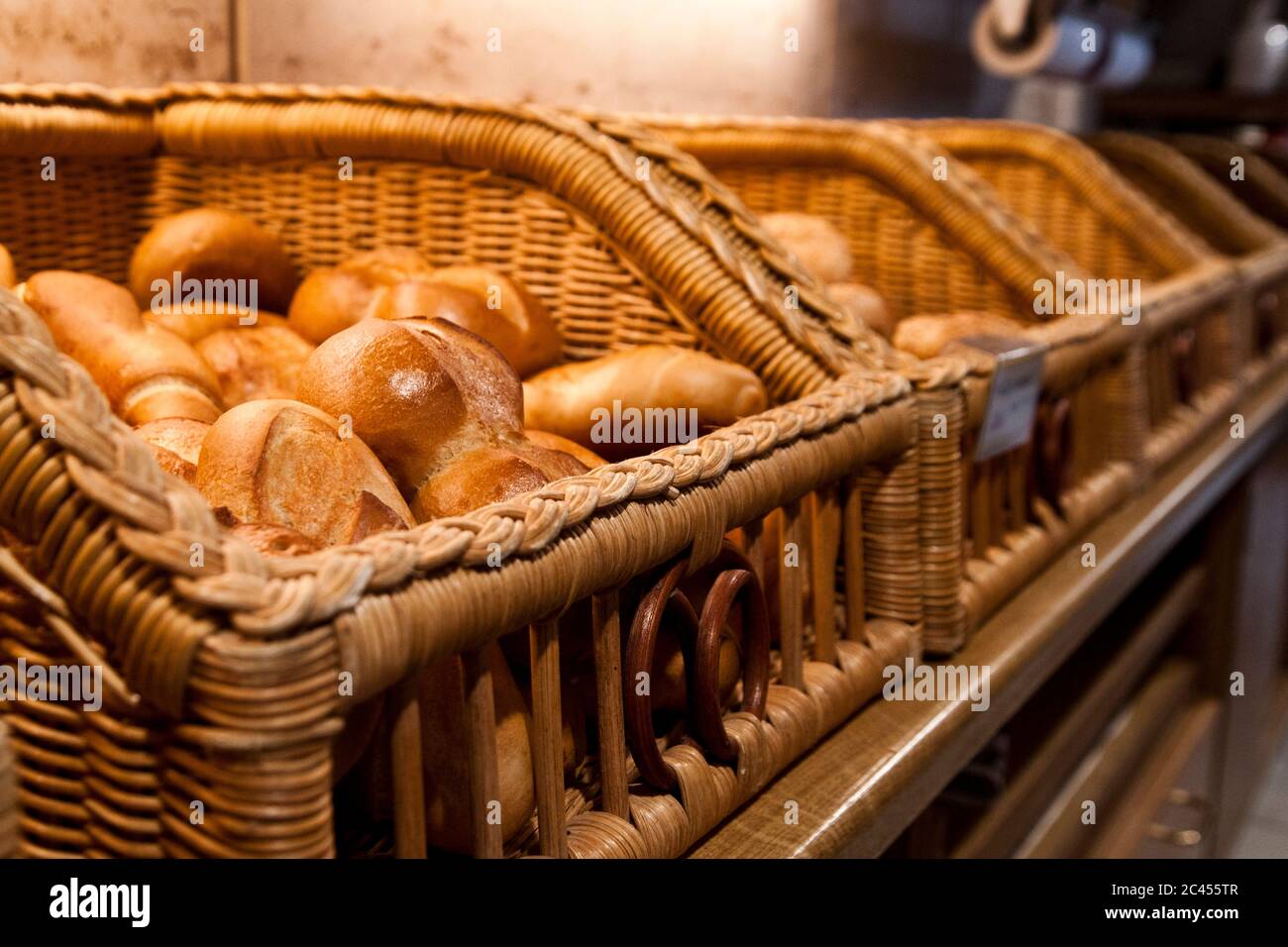 Baskets of rolls in a bakery Stock Photo - Alamy