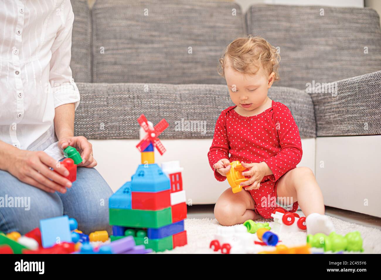 Child mom play together block hi-res stock photography and images - Alamy