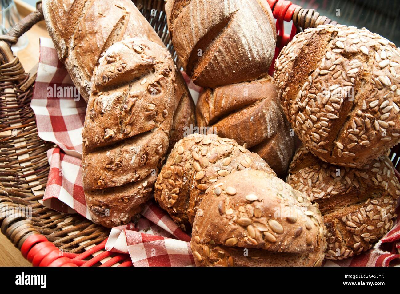 Different breads in a basket Stock Photo - Alamy