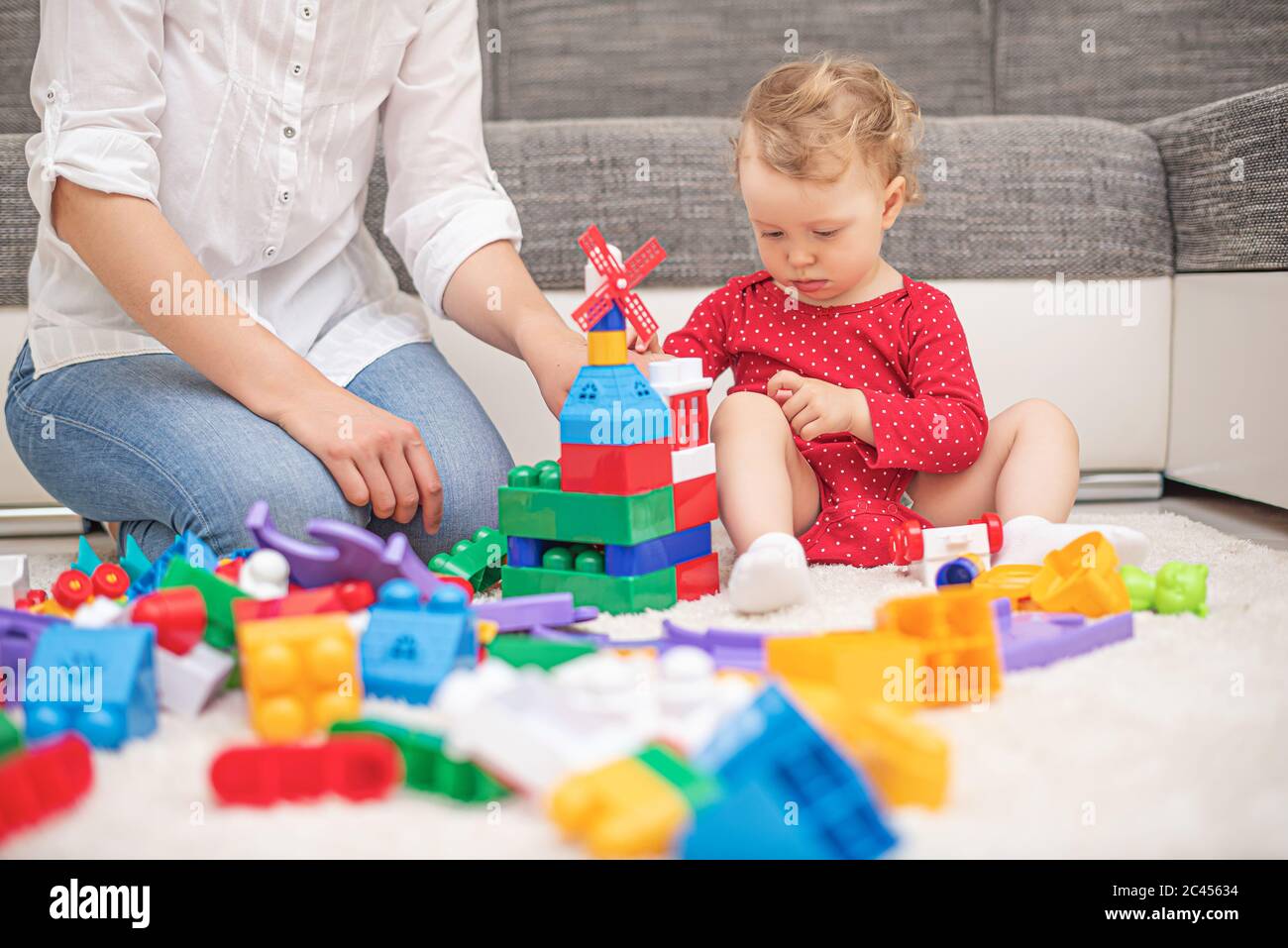 Child mom play together block hi-res stock photography and images - Alamy