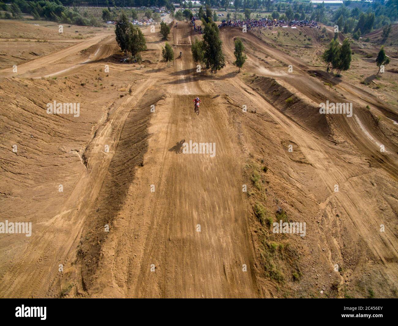 Motorcycle jumps off the ramp Stock Photo - Alamy
