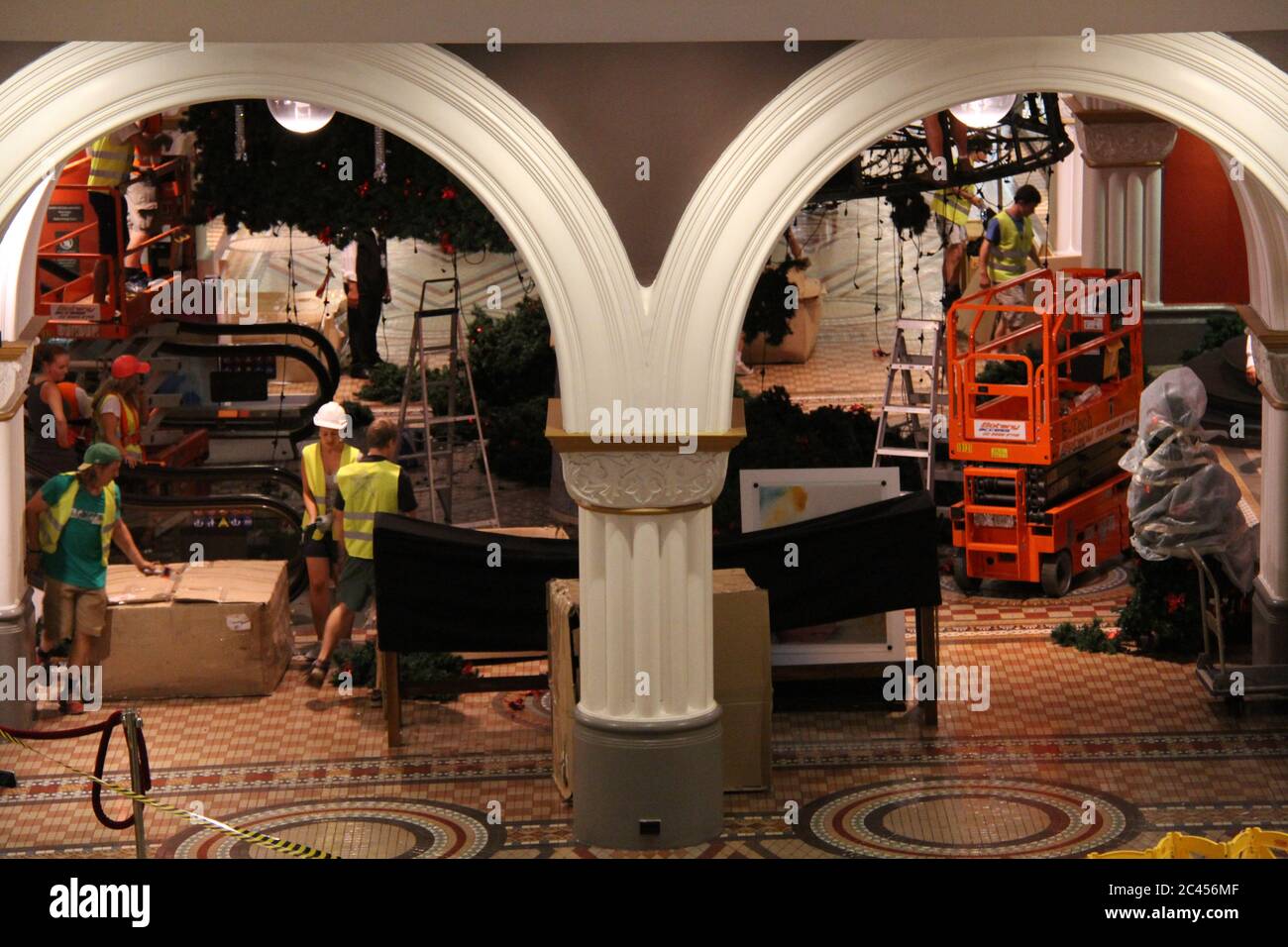 Workers dismantle the giant Christmas tree at the QVB in Sydney Stock ...