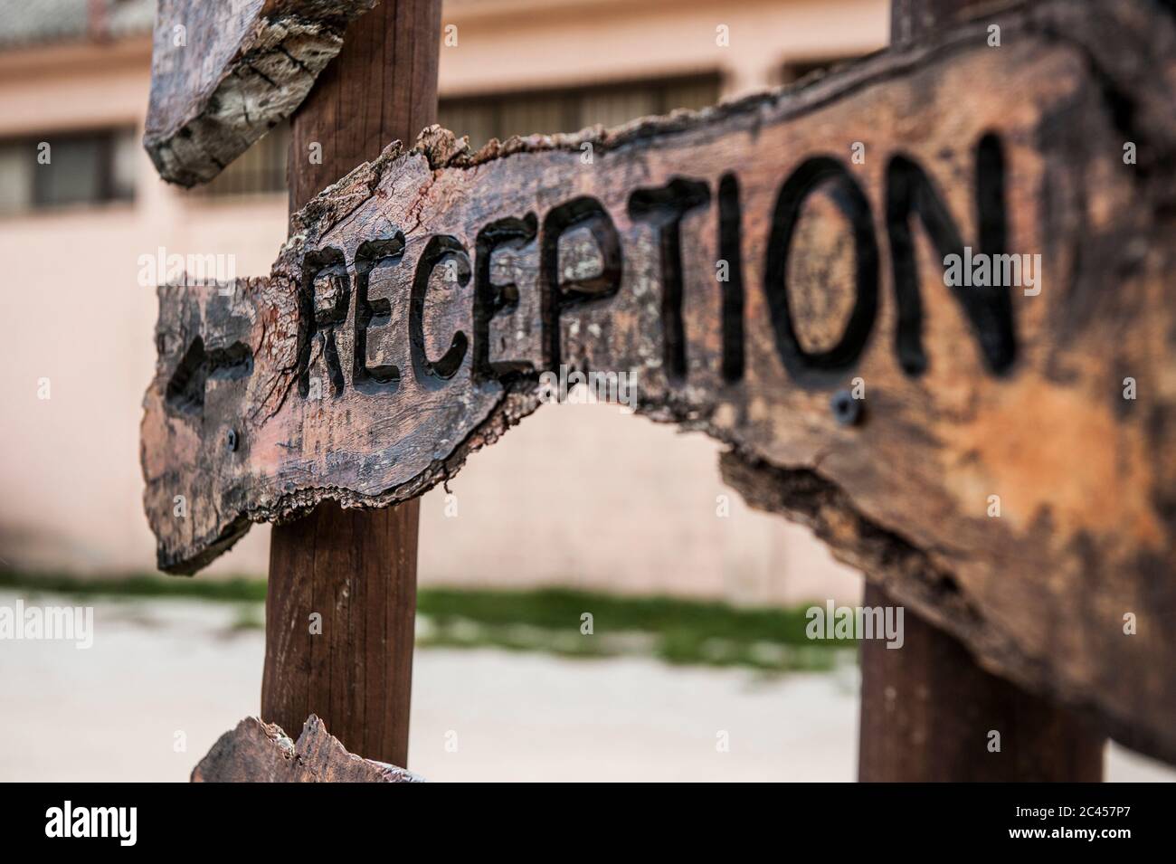 Reception sign made of wood Stock Photo - Alamy