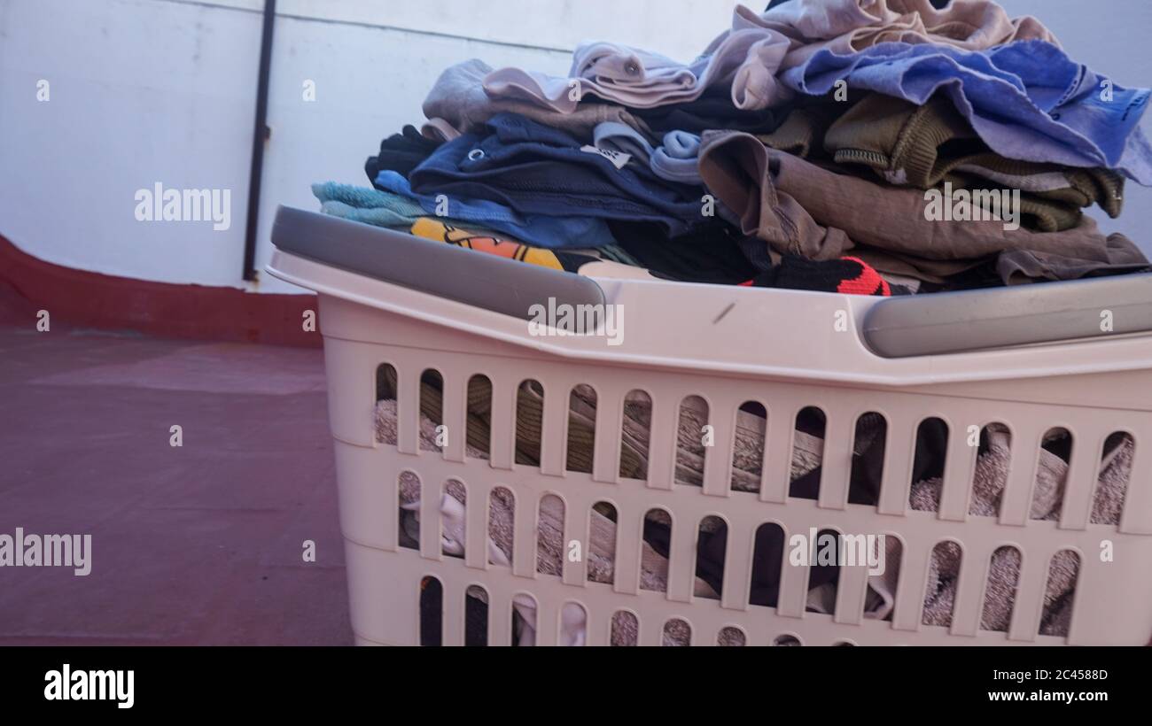 Full laundry basket in hi-res stock photography and images - Alamy