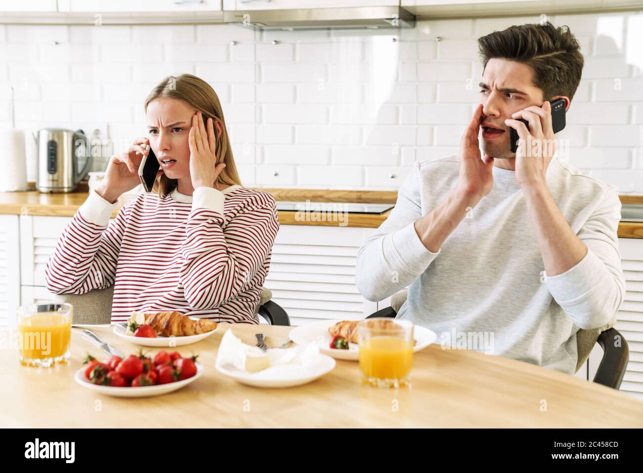Woman man confused eating not children hi-res stock photography and ...