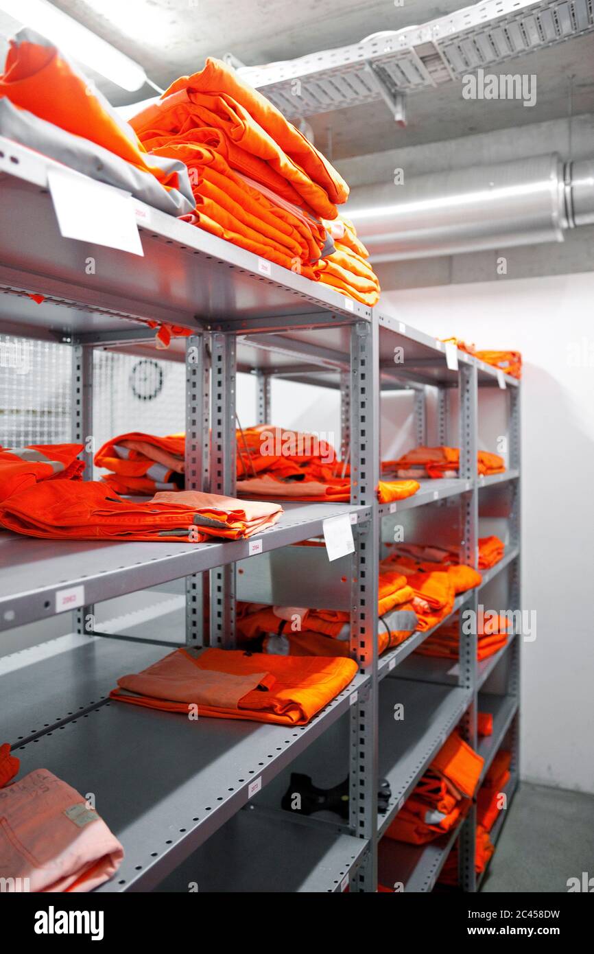Safety vests in a storage room Stock Photo - Alamy