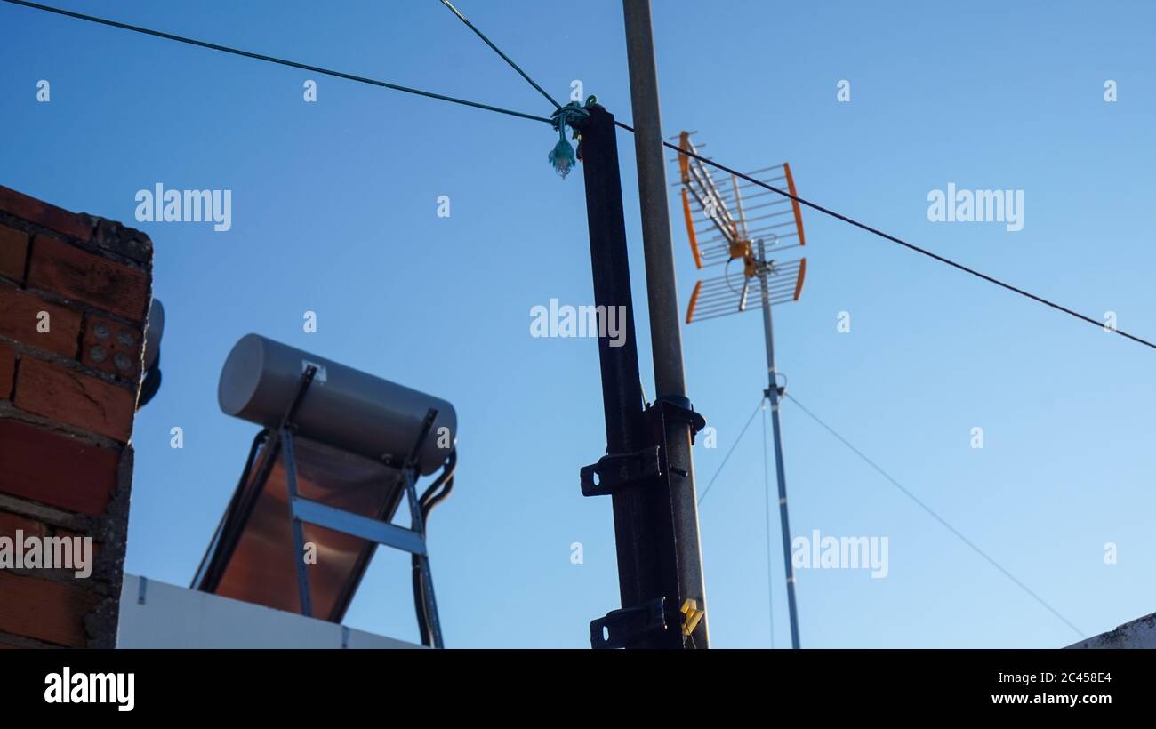 Solar panel with antenna on the rooftop Stock Photo - Alamy