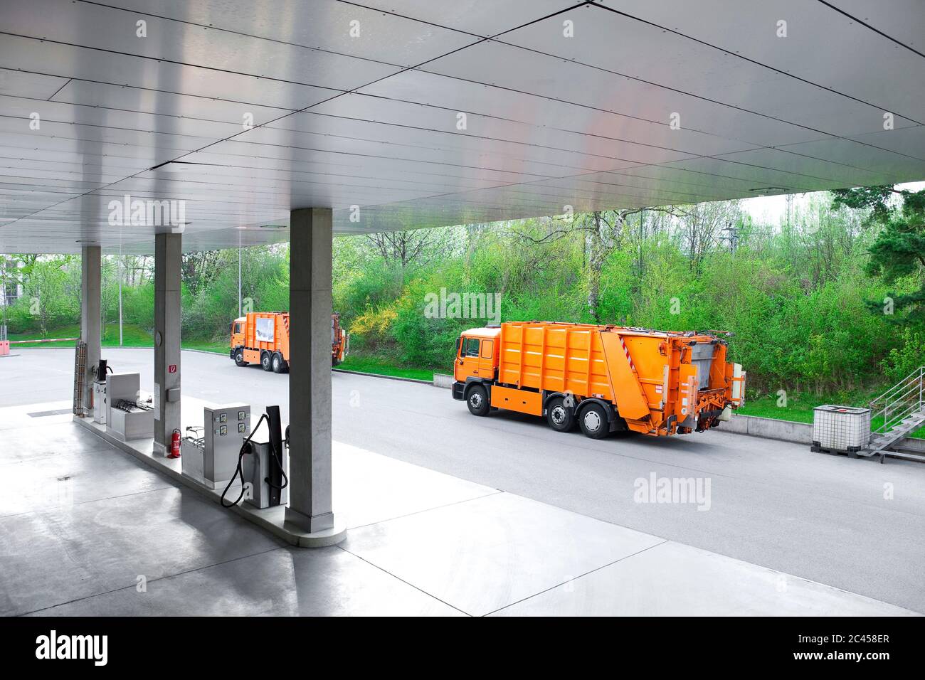 Garbage trucks on the grounds of the waste management company in Munich ...