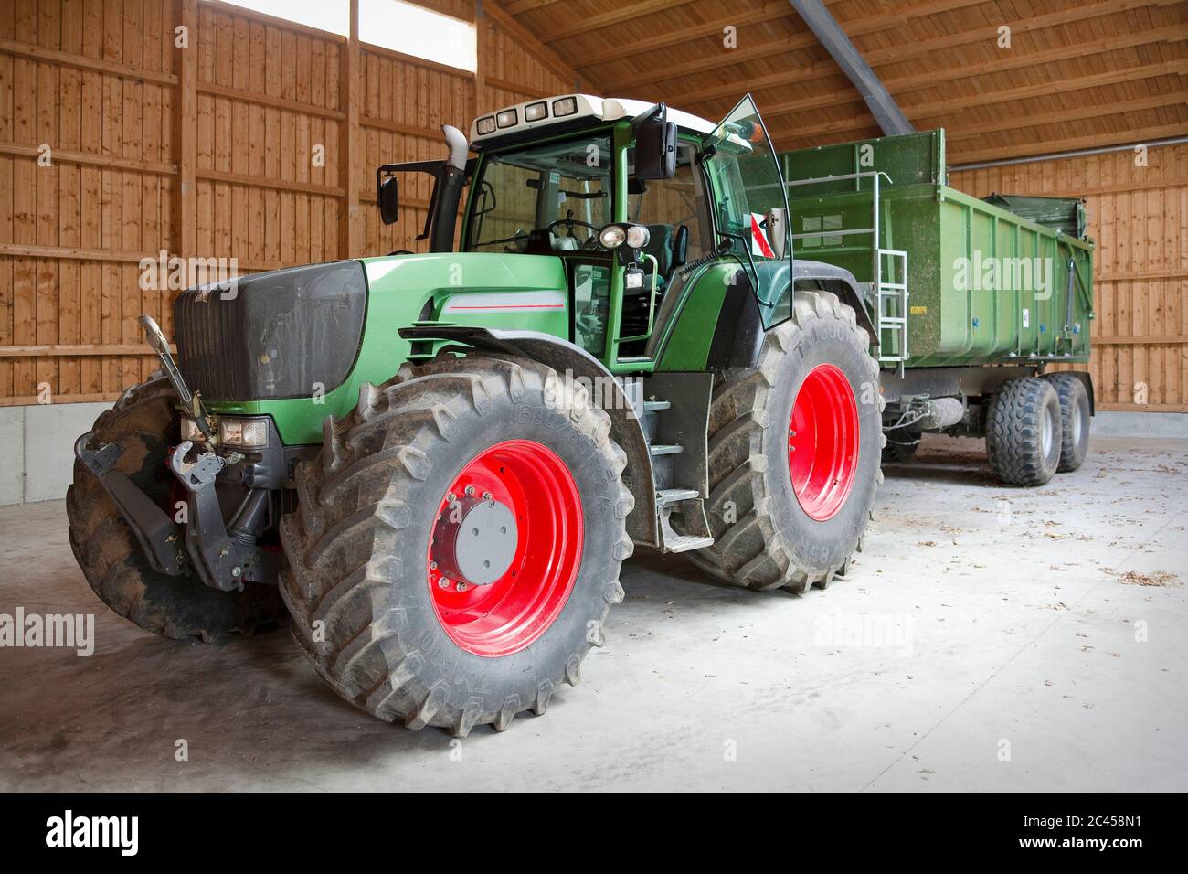 Tractor in the barn Stock Photo - Alamy