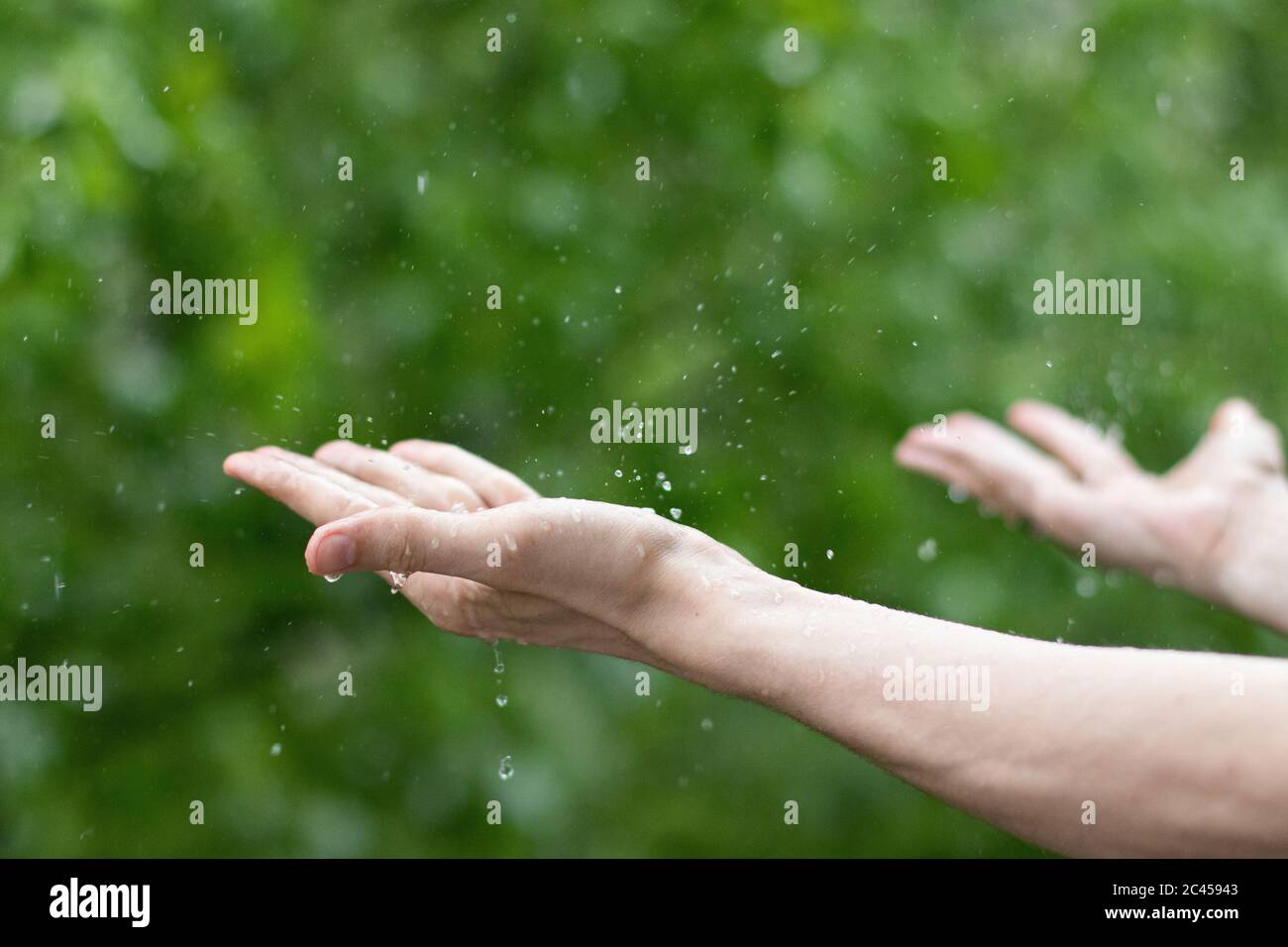 Pouring Rain Person High Resolution Stock Photography and Images - Alamy