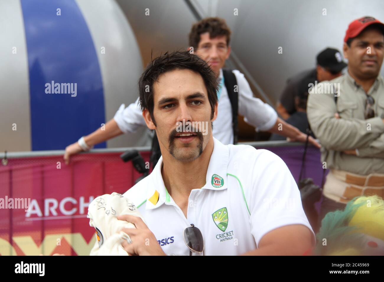 Mitchell Johnson with his moustache signed autographs for Australian ...