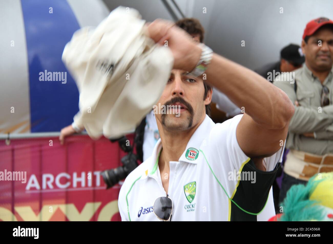 Mitchell Johnson with his moustache signed autographs for Australian ...