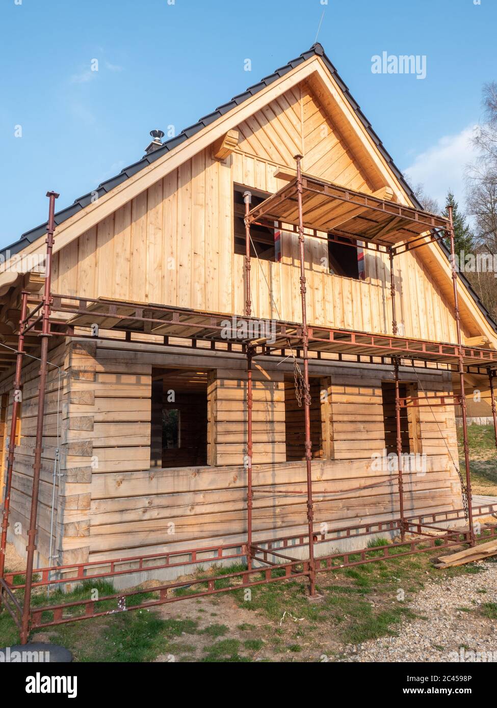 Ecological cfamily house onstruction. Lining the house of spruce boards ...