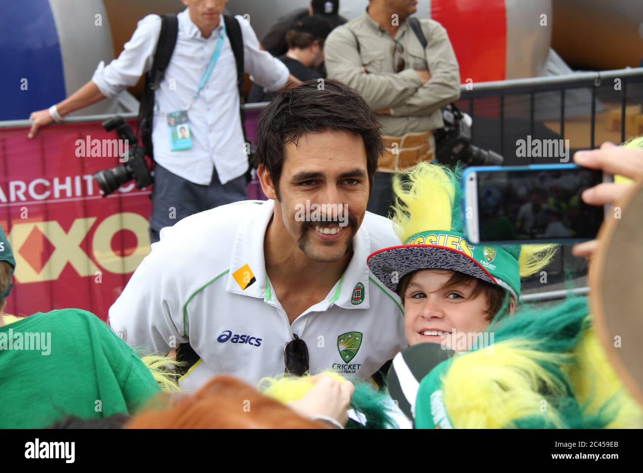 Mitchell Johnson with his moustache signed autographs for Australian ...