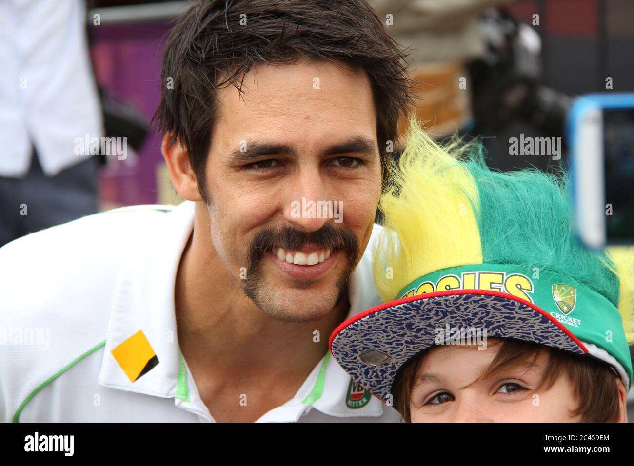Mitchell Johnson with his moustache signed autographs for Australian ...