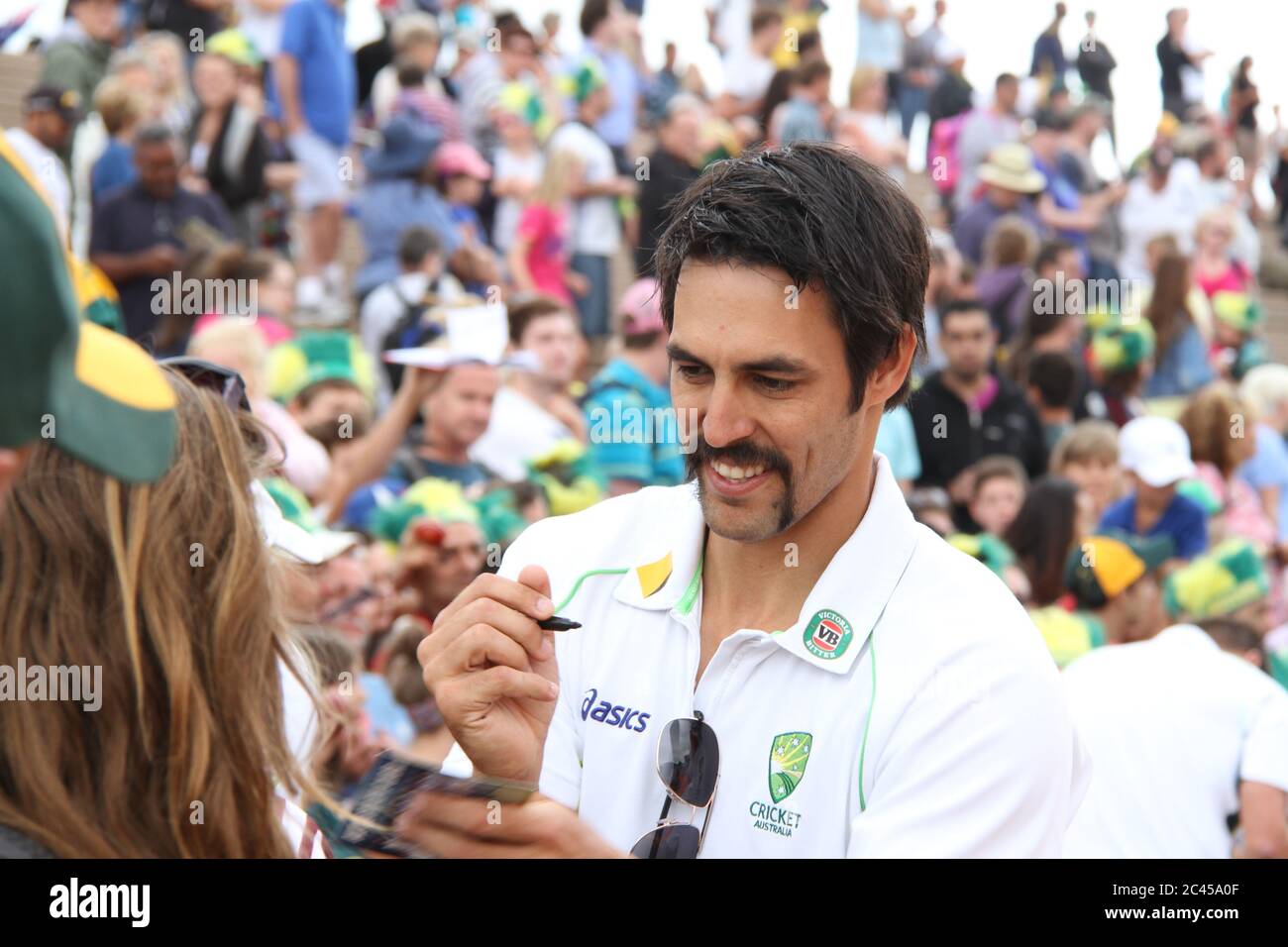 Mitchell Johnson with his moustache signed autographs for Australian ...