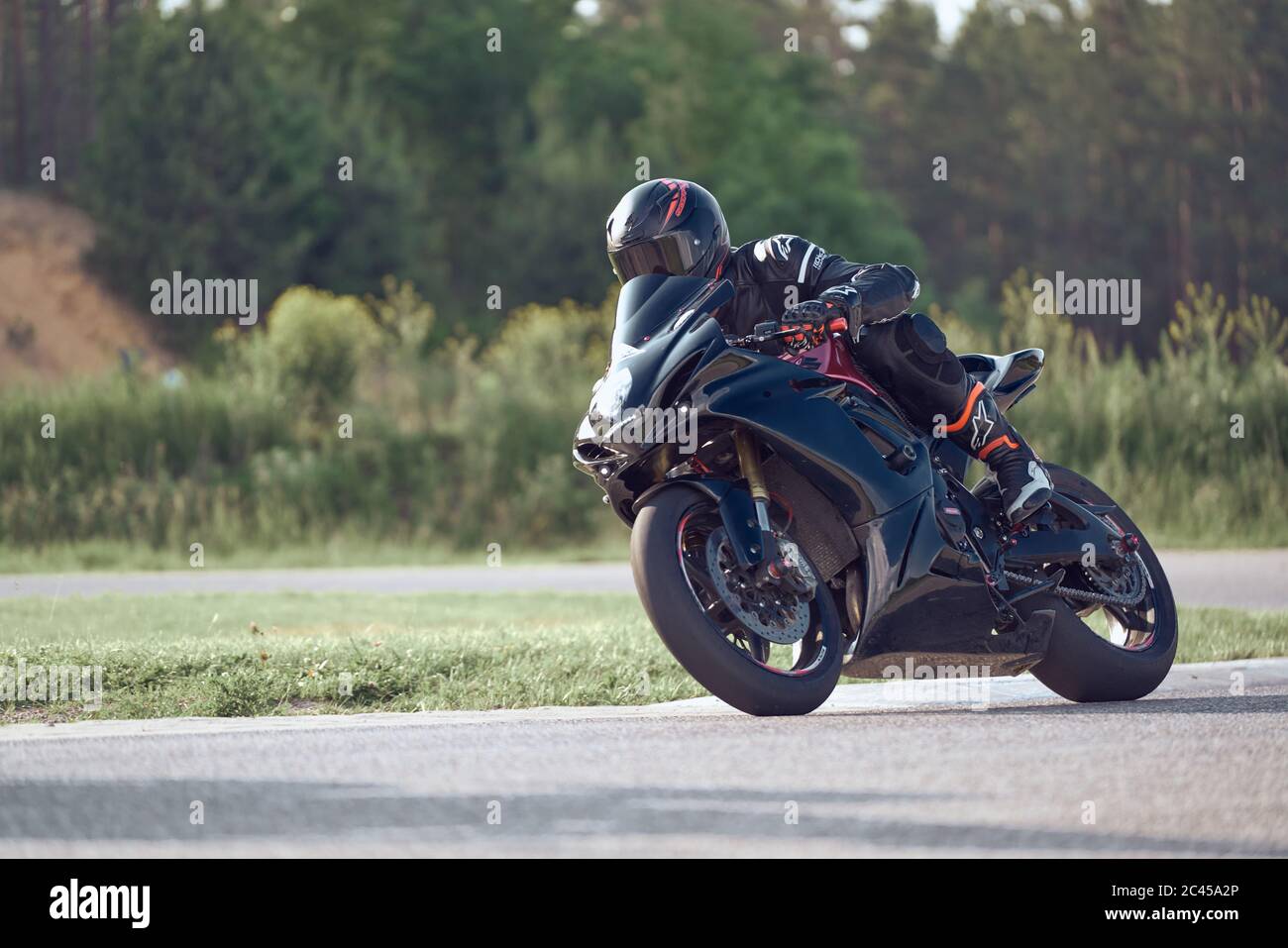 Speeding round a race circuit hi-res stock photography and images - Alamy