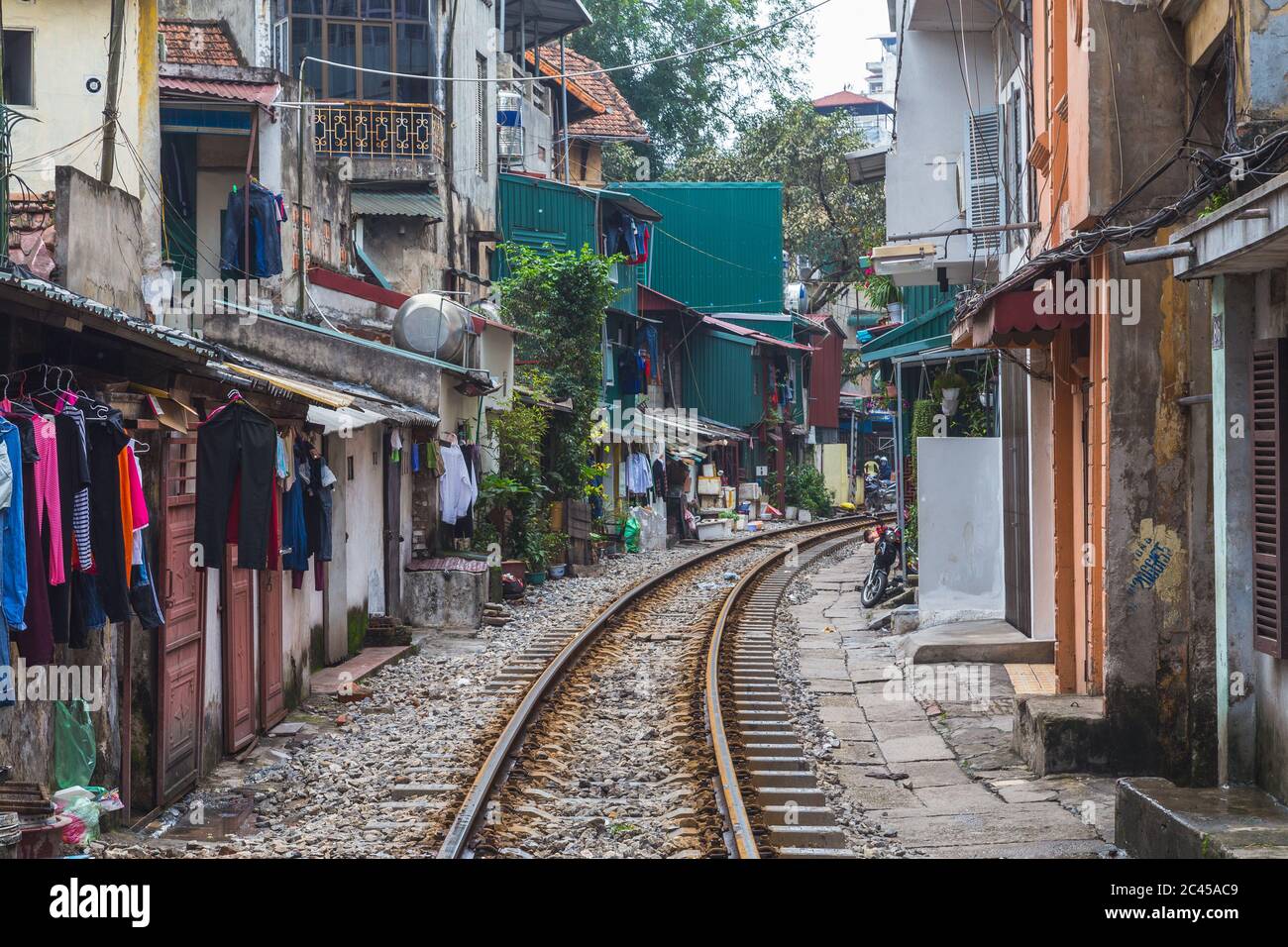 HANOI, VIETNAM - 19TH MARCH 2017: A view along train tracks running ...