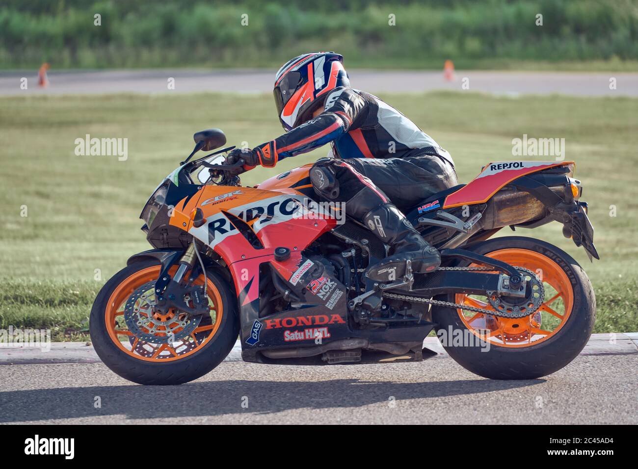 Speeding round a race circuit hi-res stock photography and images - Alamy