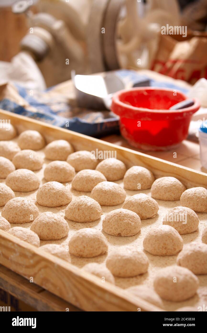Raw rolls in a bakery Stock Photo - Alamy