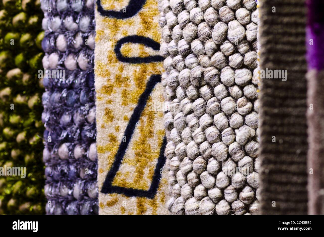 Colorful floor carpet samples vertical Stock Photo - Alamy