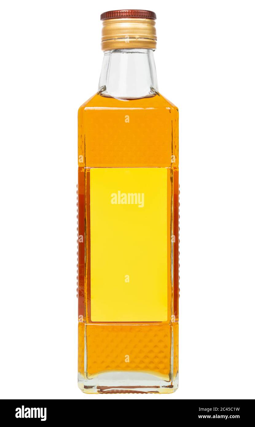 small rectangular glass bottle of yellow chinese oil isolated on white ...