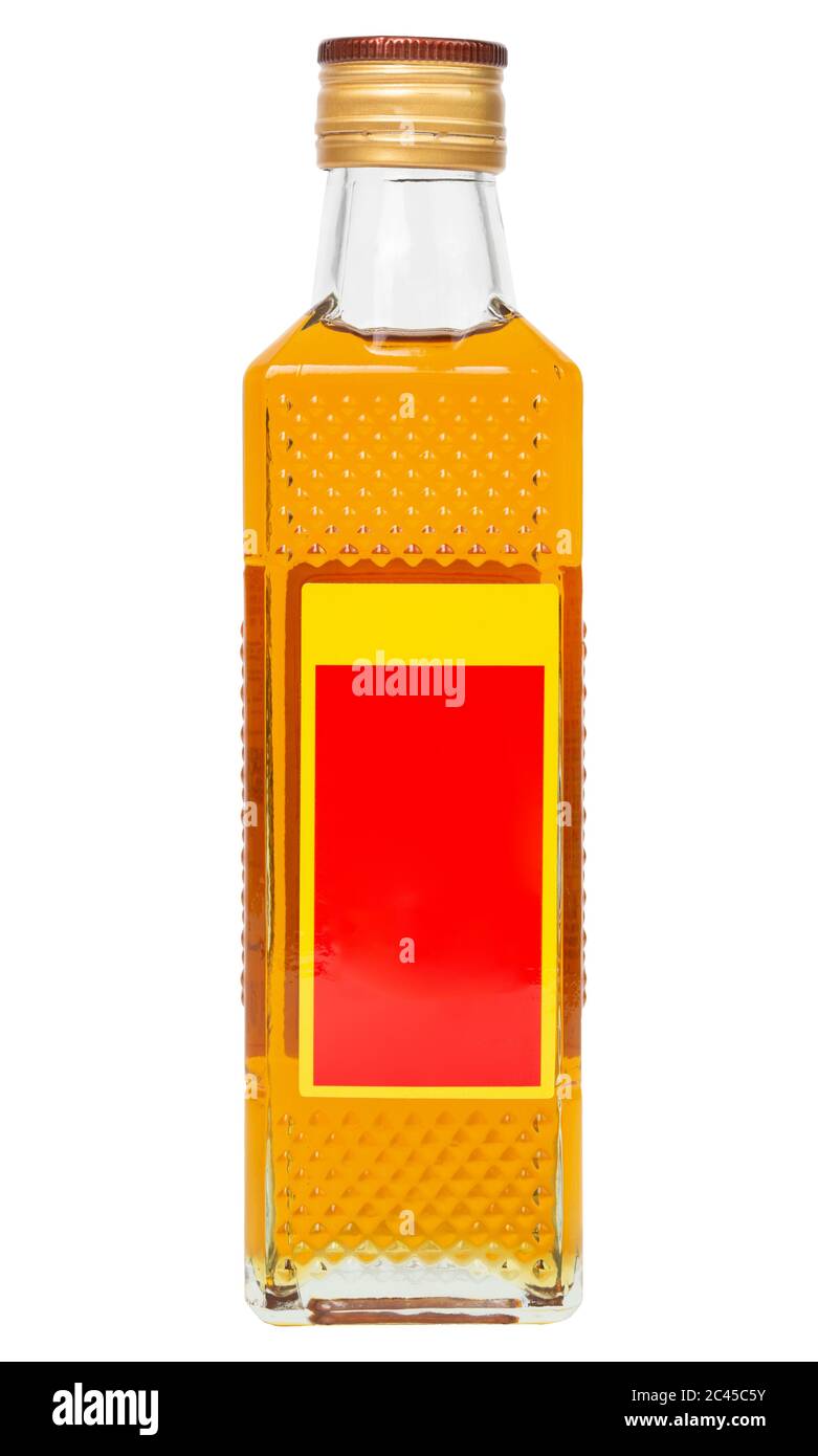 small rectangular glass bottle of yellow chinese oil isolated on white ...