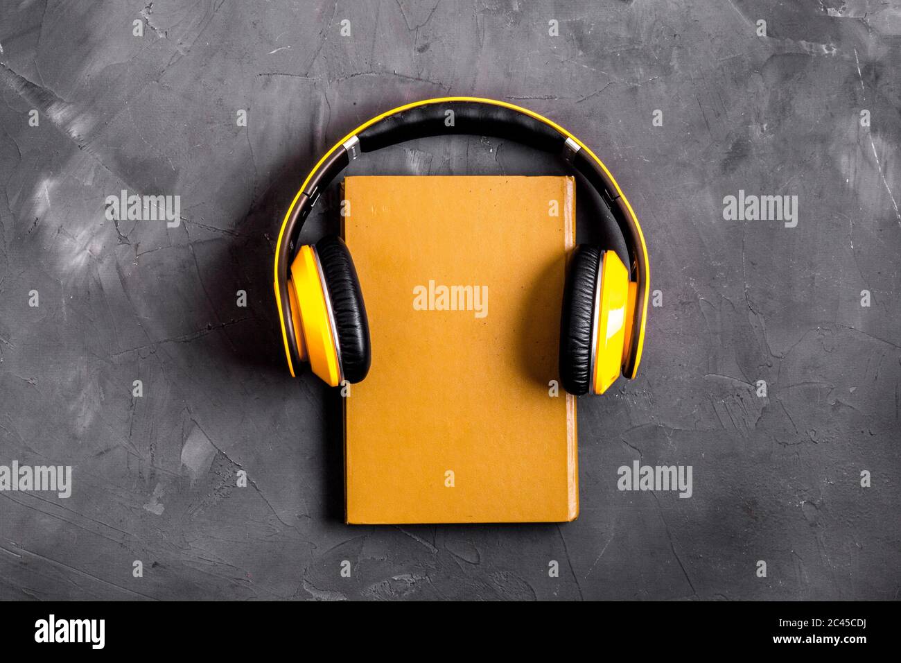 Book yellow headphones on hi-res stock photography and images - Alamy
