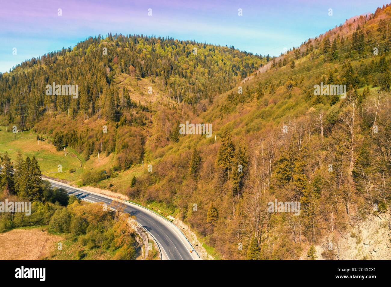 Panoramic aerial view of the mountains with highway. Beautiful mountain ...