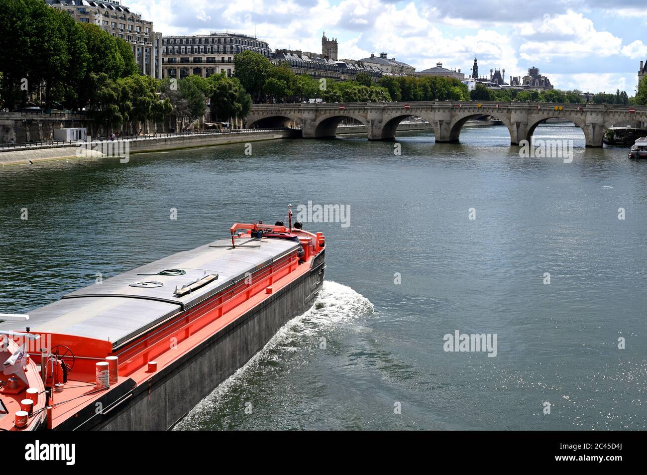 Long barge on the Seine river in Paris Stock Photo - Alamy