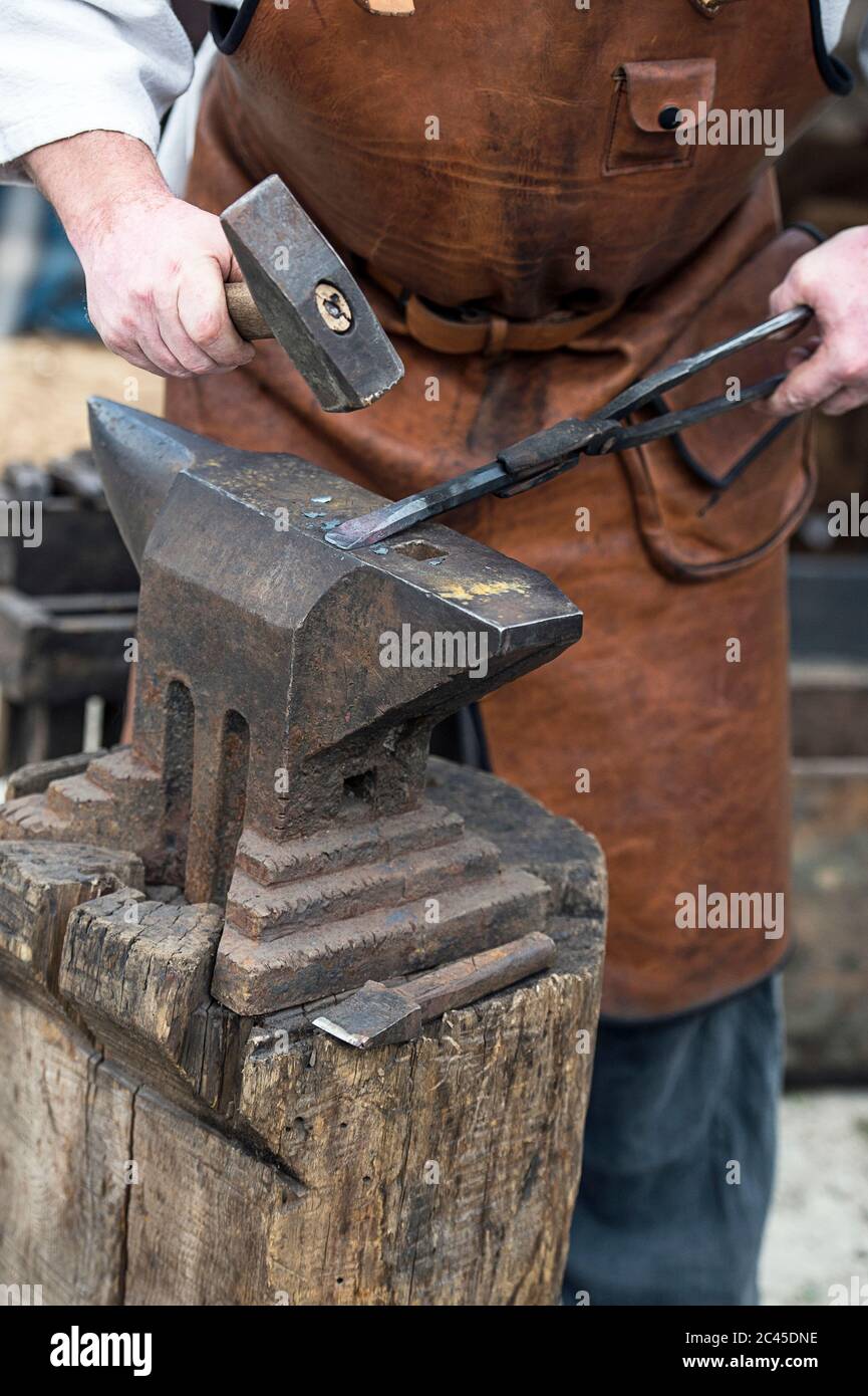 Blacksmith at work Stock Photo - Alamy