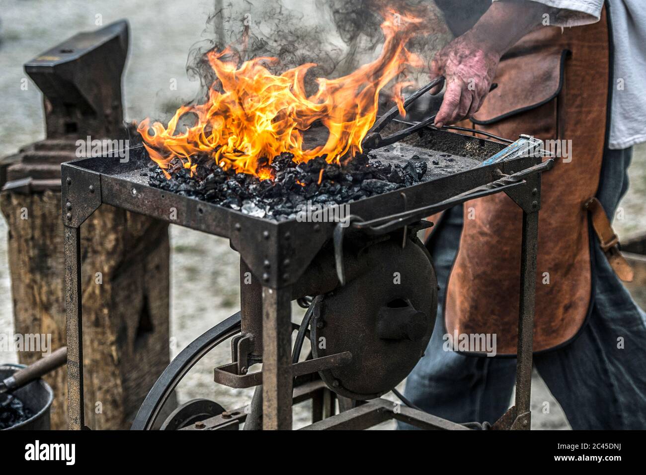 Blacksmith at work Stock Photo - Alamy