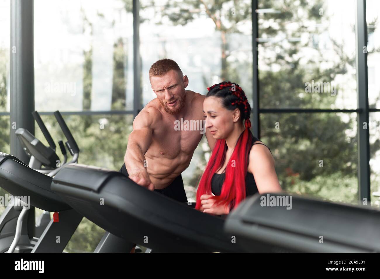 Muscular man running on treadmill hi-res stock photography and images ...