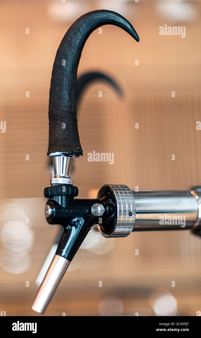 Tap with horn Stock Photo - Alamy