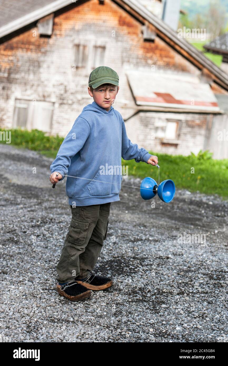 Boy is playing with a diabolo Stock Photo - Alamy