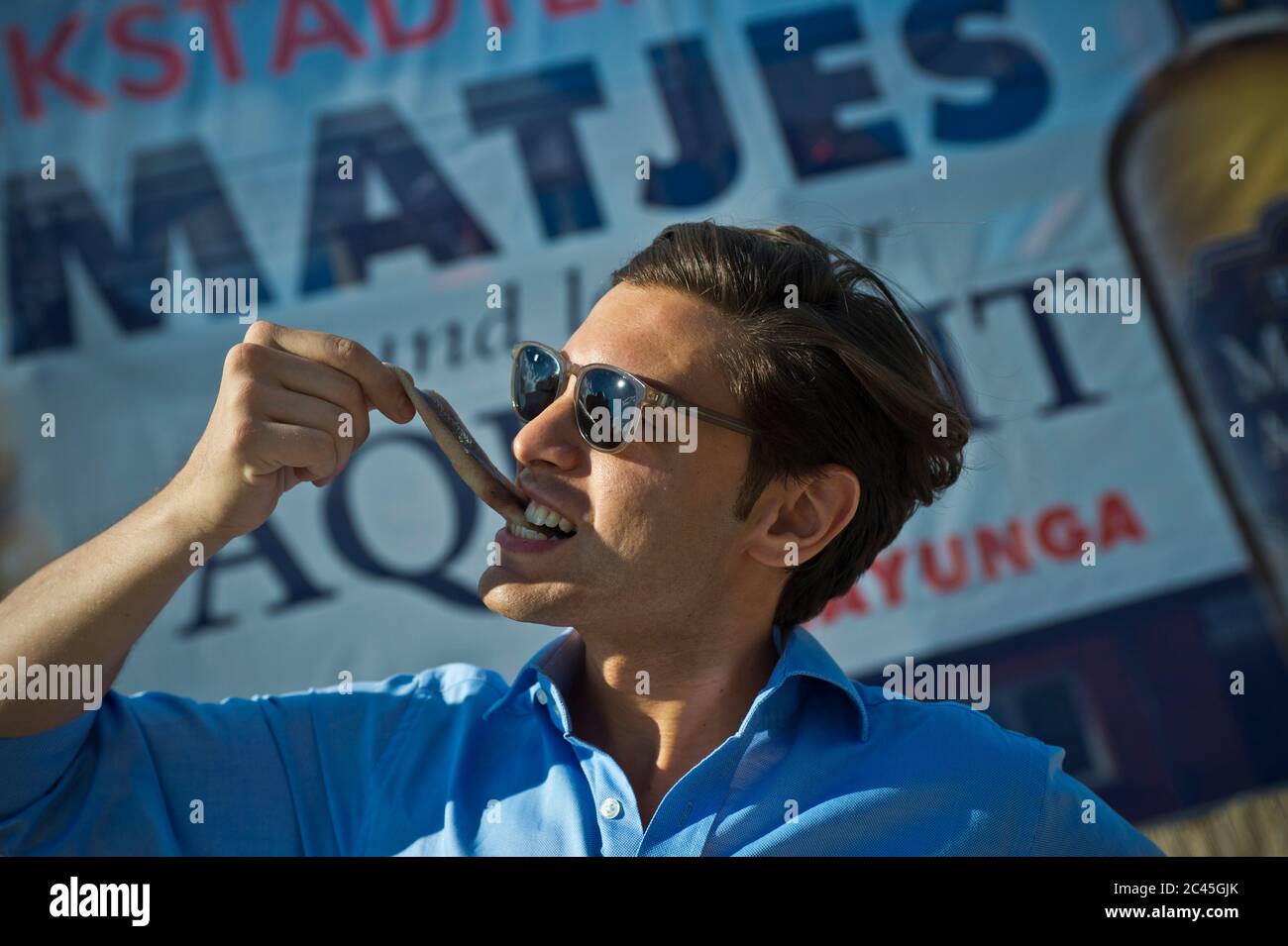 Man eats fish hi-res stock photography and images - Alamy