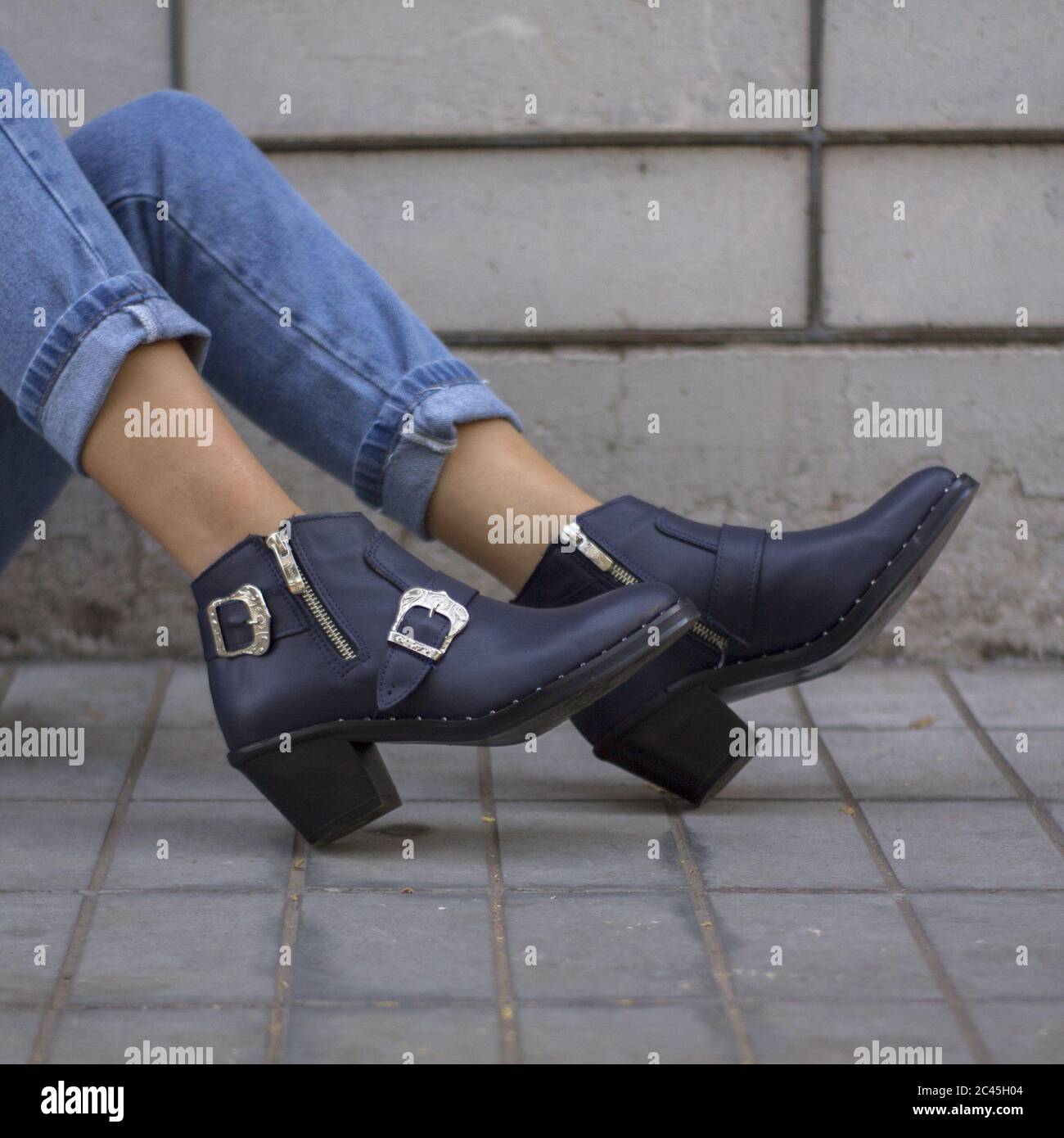 Fashionable woman wearing denim colored elegant and beautiful heels ...