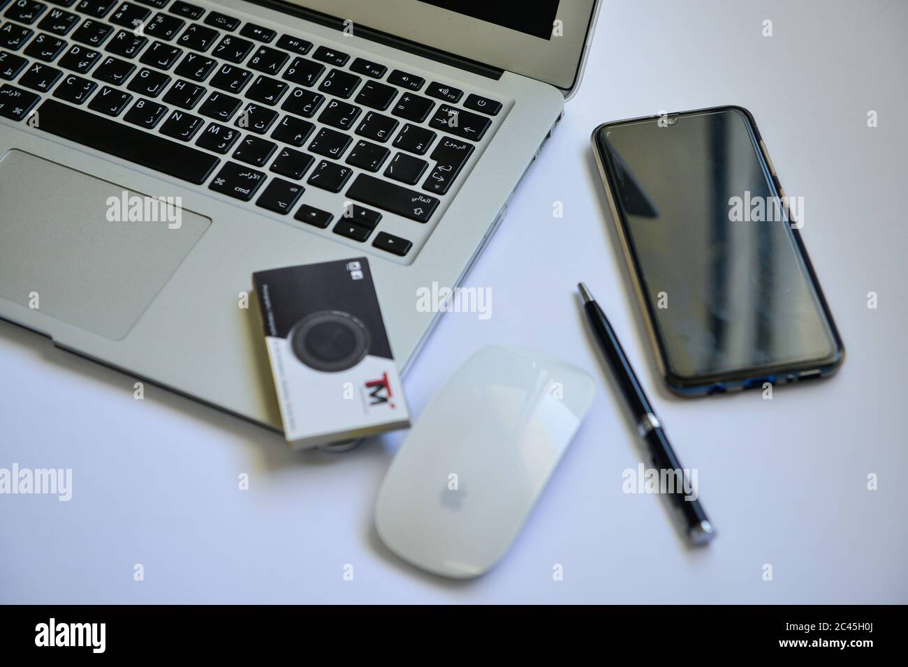 White Aluminum Keyboard with mobile and muse on white background Stock ...