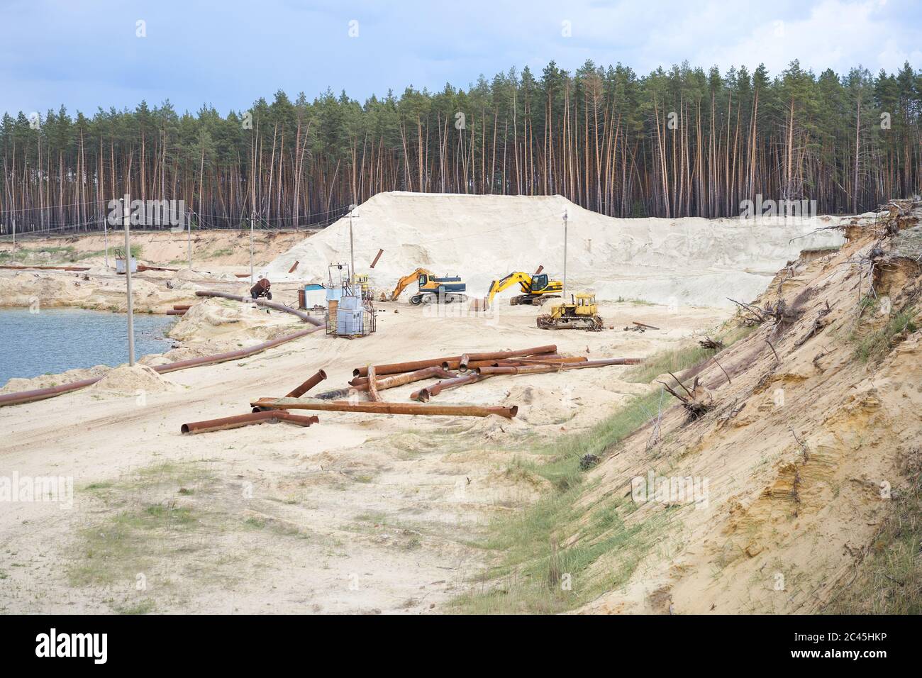 Sand quarry mining industry equipment excavator tractor standing sand ...