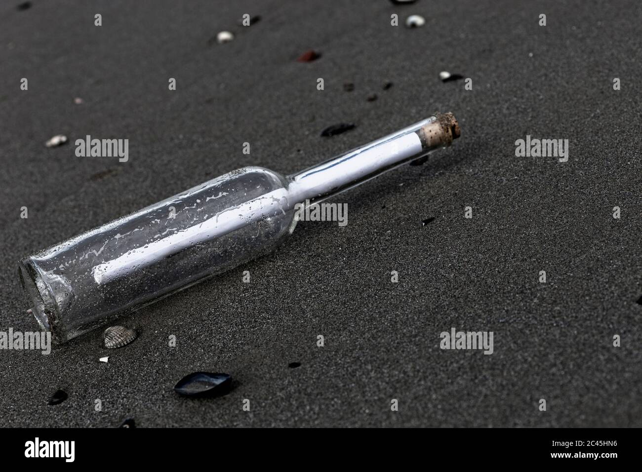 Message in a bottle on the beach Stock Photo - Alamy