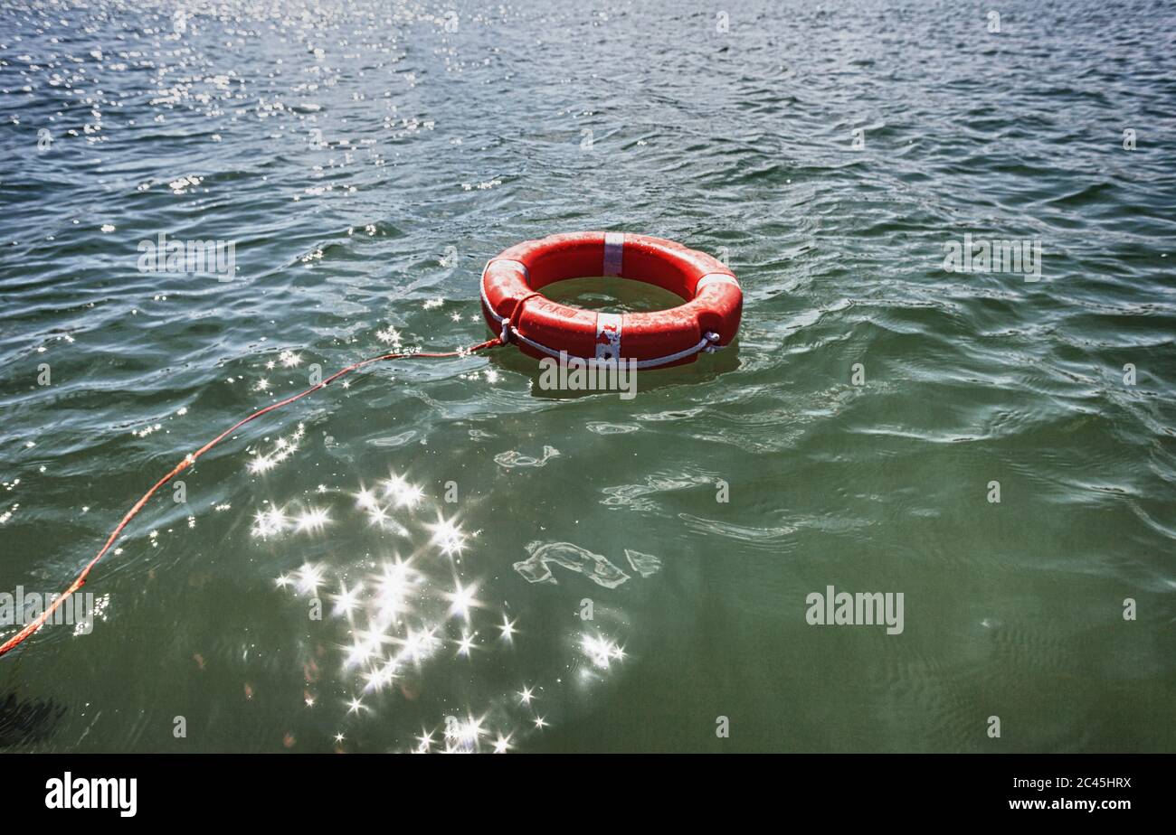 Lifebuoy floats on the sea Stock Photo - Alamy