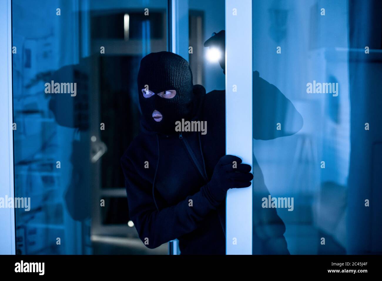 Person entering house hi-res stock photography and images - Alamy