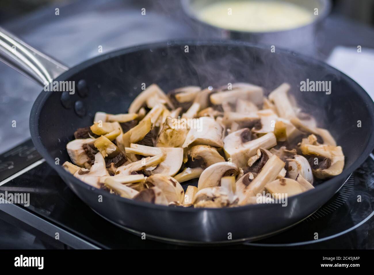 Sauteing process hi-res stock photography and images - Alamy