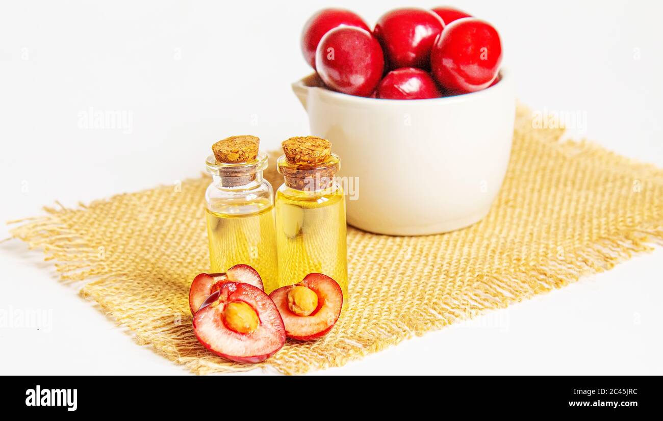 cherry oil in a small jar. selective focus. nature Stock Photo - Alamy