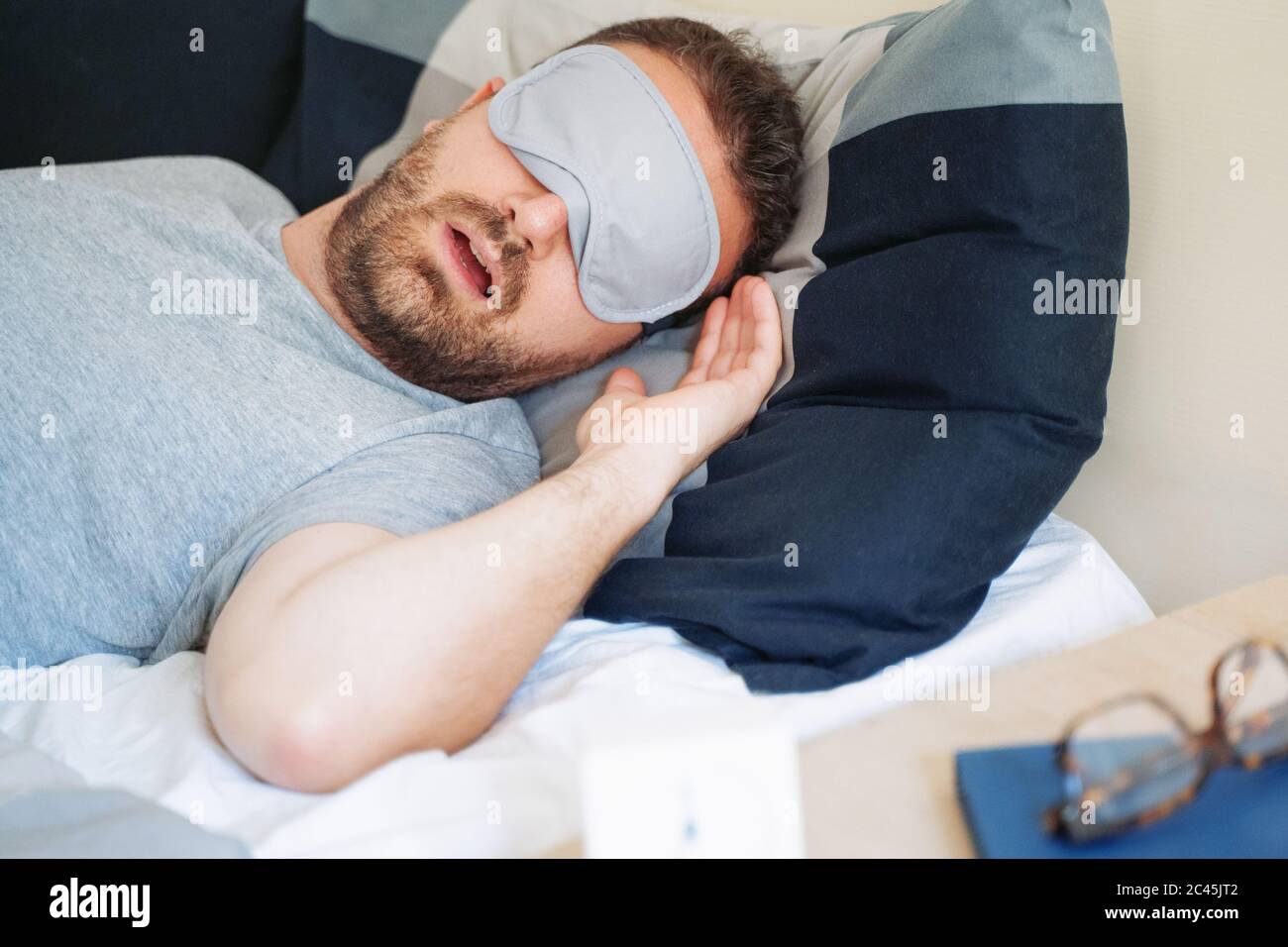 Sleep mask man hi-res stock photography and images - Alamy