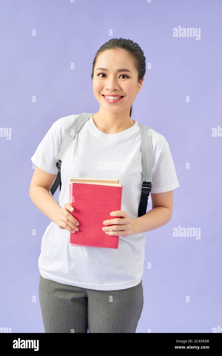 Smiling female student enhancing her future by attending regular ...