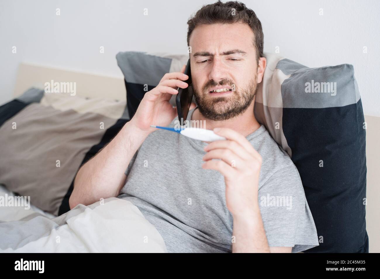 Sick home phone hi-res stock photography and images - Alamy